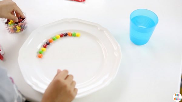 Magical Skittles Rainbow Science Experiment - Fun with Mama