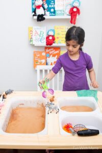 Muddy Oobleck Sensory Table With Animals - Fun with Mama