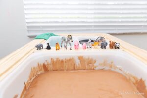 Muddy Oobleck Sensory Table With Animals - Fun with Mama