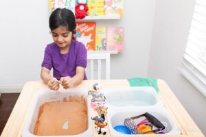 Muddy Oobleck Sensory Table With Animals - Fun with Mama